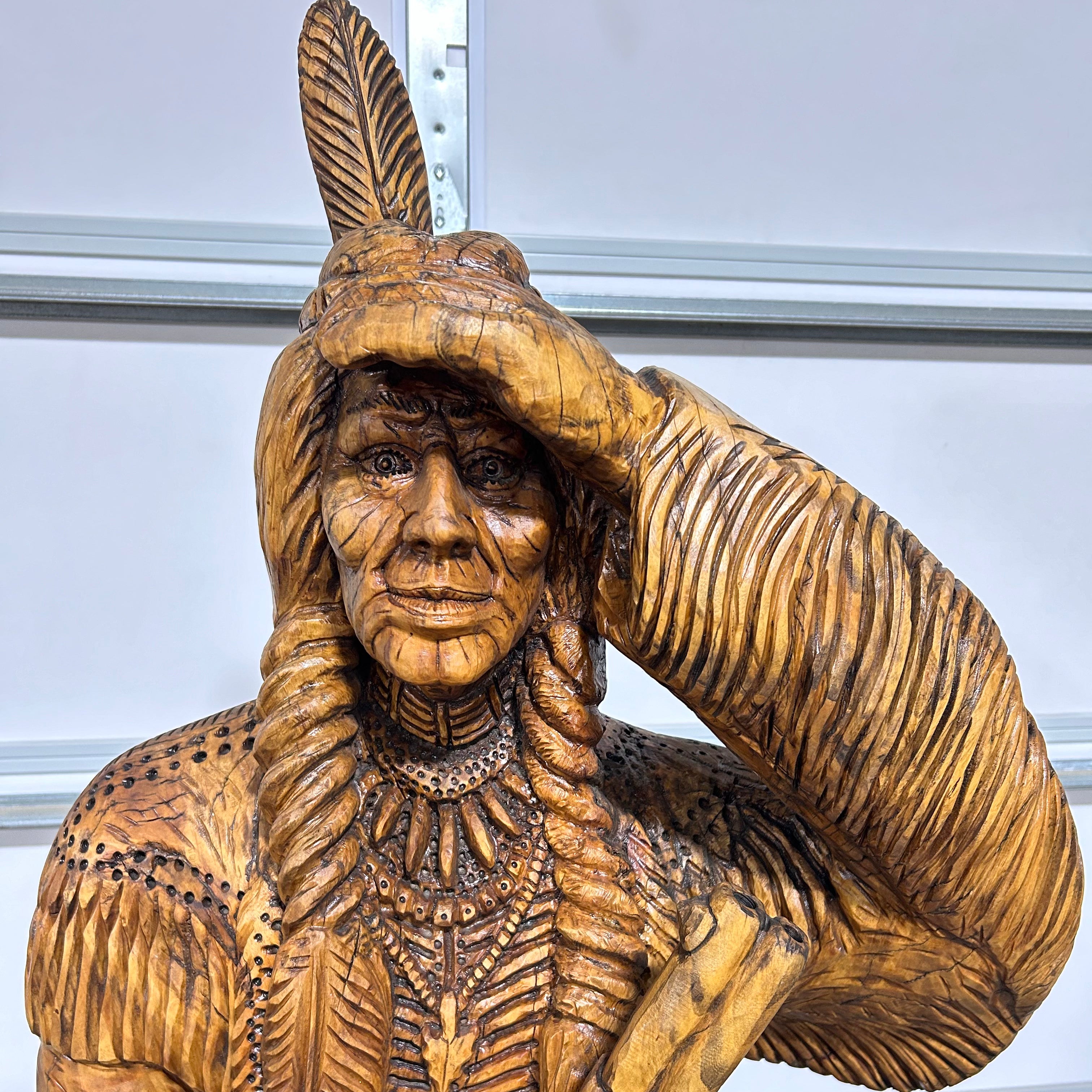 Hand Carved Cedar Wood Indian Holding a Stick | The Forest Store